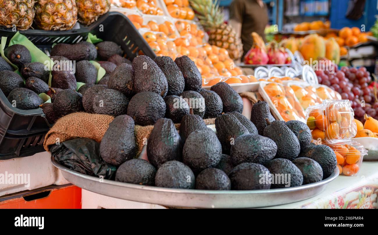 Bazaar selling summer fruits in shop showing plenty types of fruits and ...