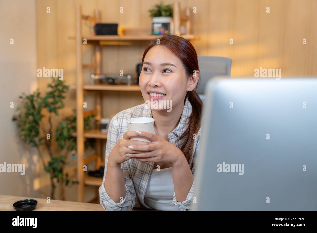 female working and break for coffee Stock Photo - Alamy