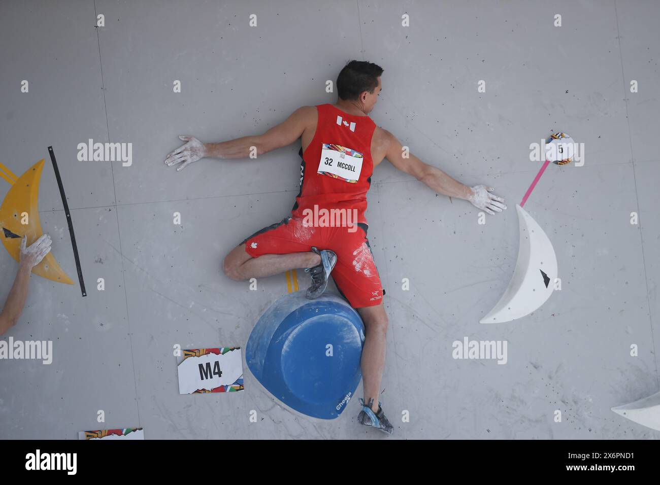 Shanghai. 16th May, 2024. Sean Mccoll of Canada competes the boulder ...