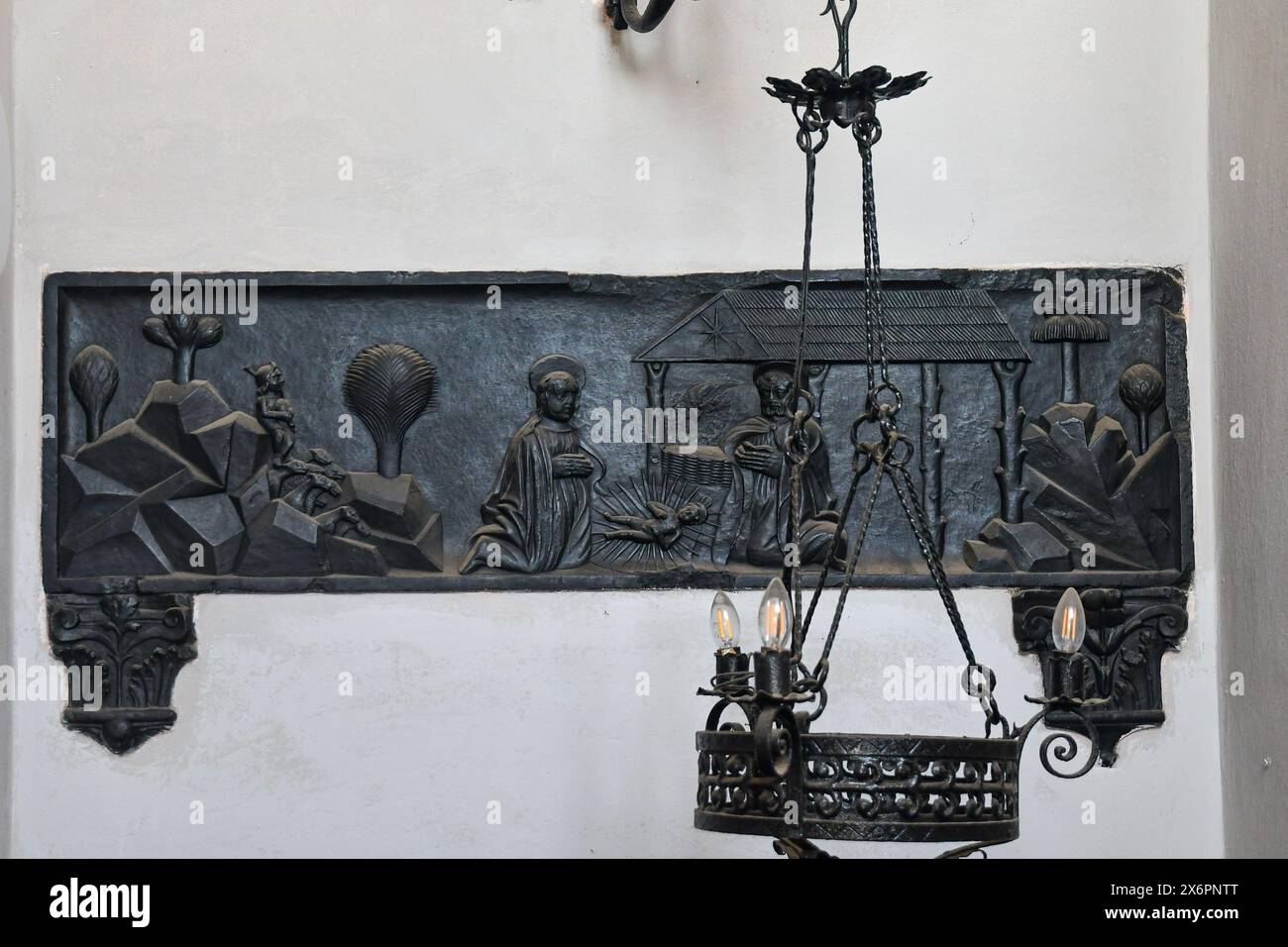 Slate stone bas-relief depicting the nativity scene with a wrought iron ...