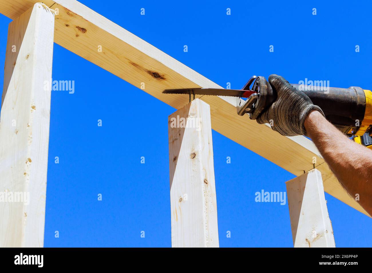 Working with reciprocating saw in construction theme is power tool for ...