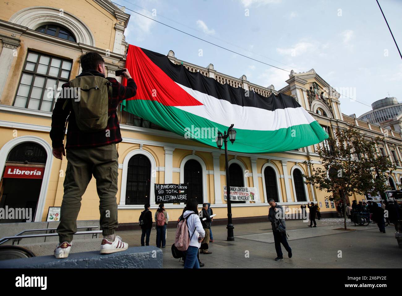 Chilean university students display a giant Palestinian flag during a ...