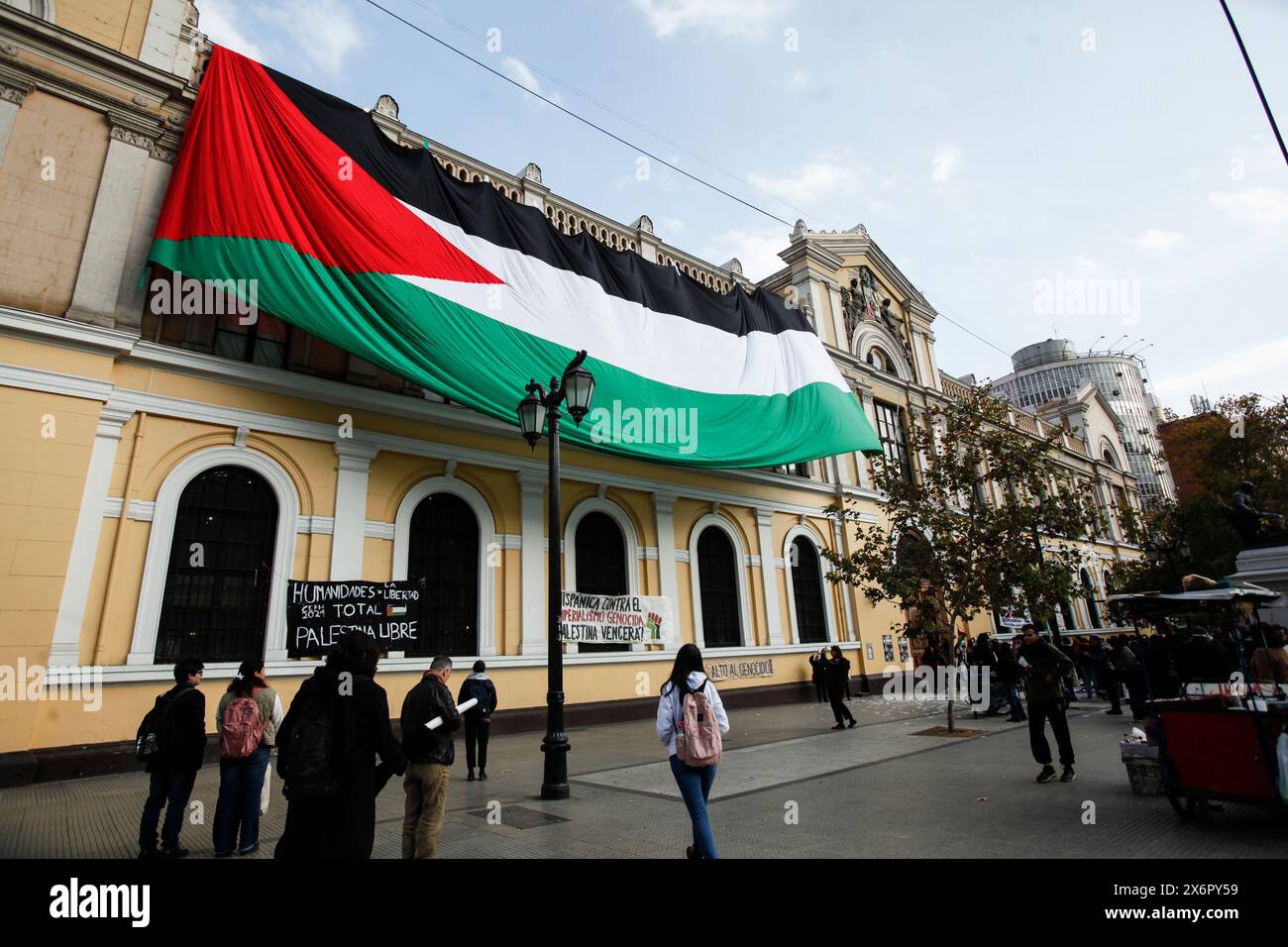 Chilean university students display a giant Palestinian flag during a ...