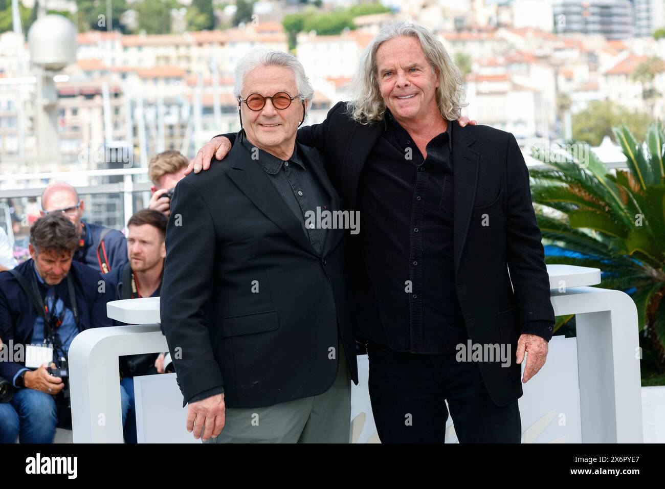 George Miller and Doug Mitchell pose at the photo call of 'Furiosa: A ...