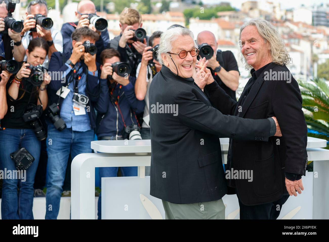 George Miller and Doug Mitchell pose at the photo call of 'Furiosa: A ...