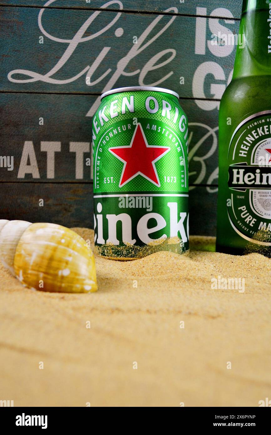 Heineken 33cl can of lager beer with decorative background near the ...