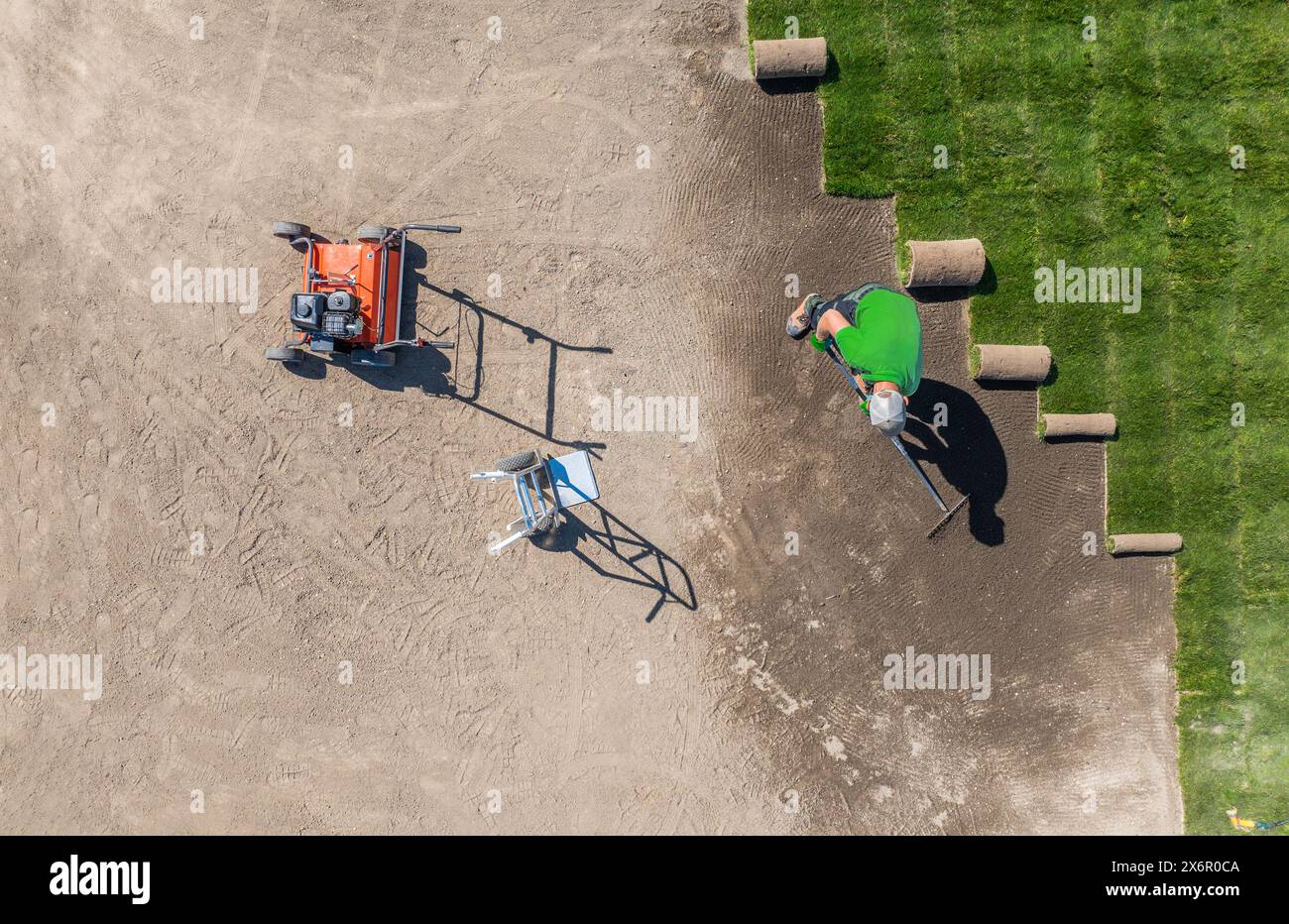Aerial view of the gardener installing new grass turfs Stock Photo - Alamy