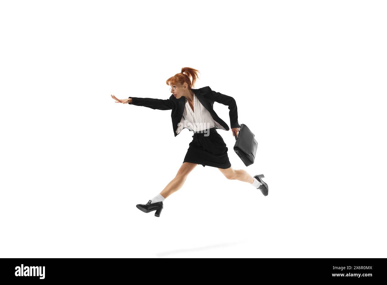 Ambitious young woman, employee on formal wear, with briefcase in ...