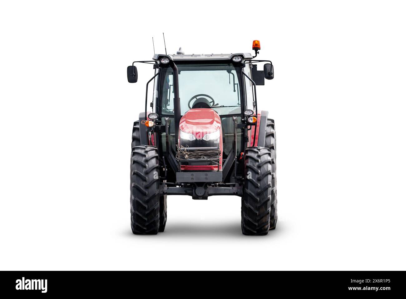 Front view of the modern wheeled tractor isolated on white background ...