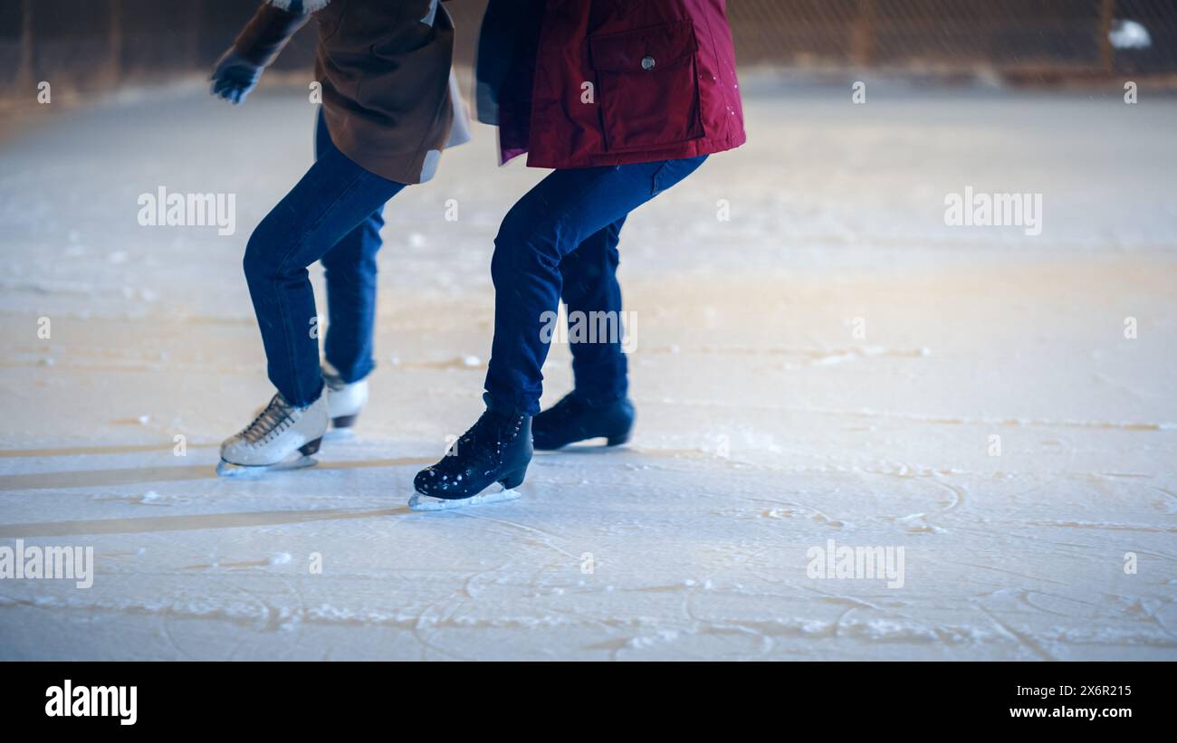Romantic Winter Snowy Evening: Ice Skating Couple Having Fun on Ice ...