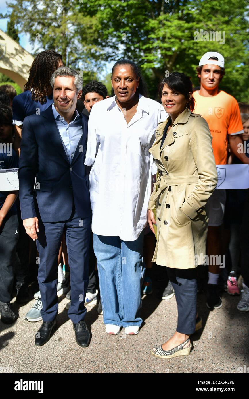 French sprinter and Olympic champion Marie-Jose Perec (C) poses with ...