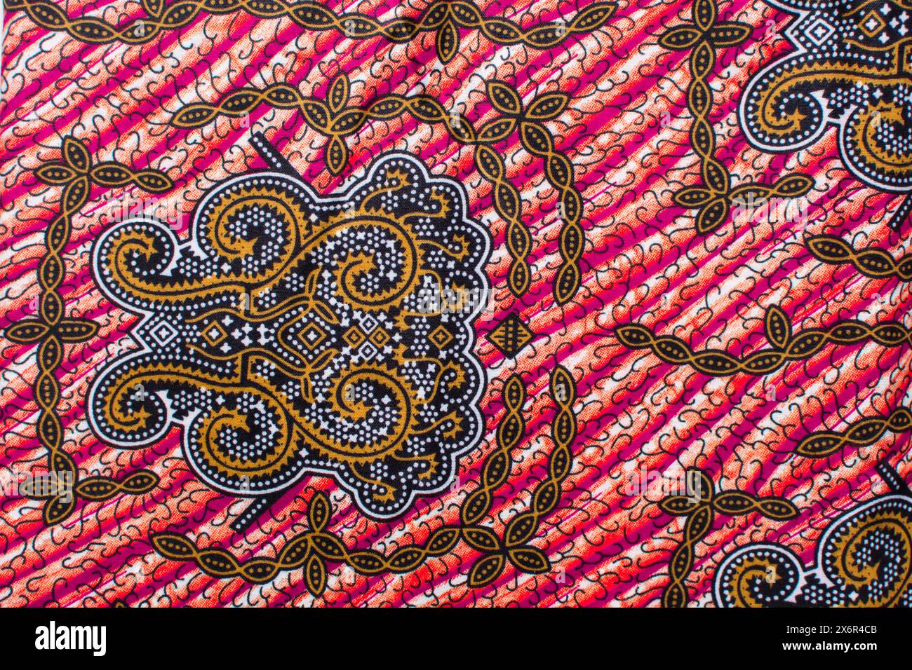 top view of red yellow ankara fabric, flatlay of nigerian wax cloth ...