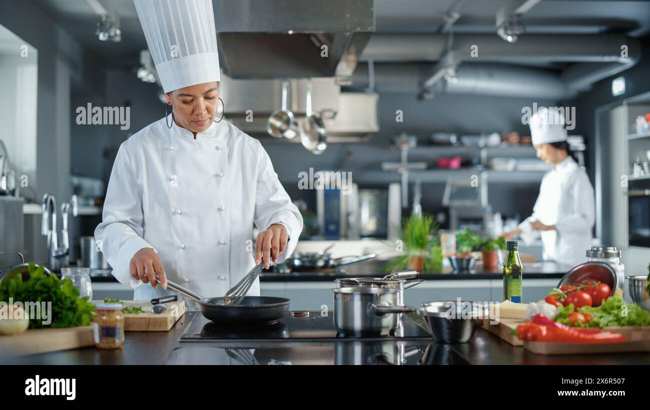 Restaurant Kitchen: Black Female Chef Cooking Delicious and Traditional ...