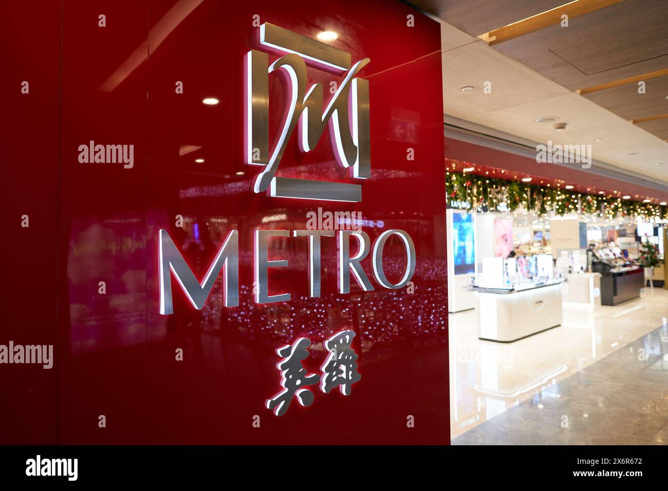 SINGAPORE - NOVEMBER 06, 2023: close up shot of Metro sign as seen in ...