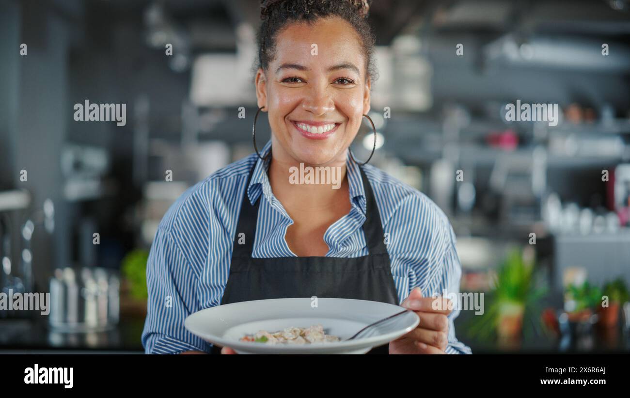 Restaurant Kitchen: Portrait of Black Female Chef Prepares Dish ...