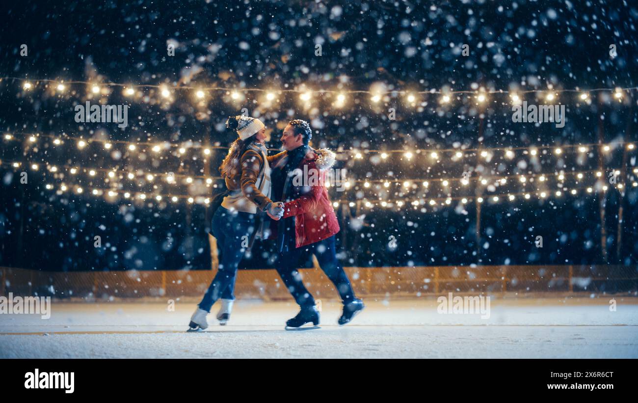 Romantic Winter Snowy Evening: Ice Skating Couple Having Fun, Step on ...