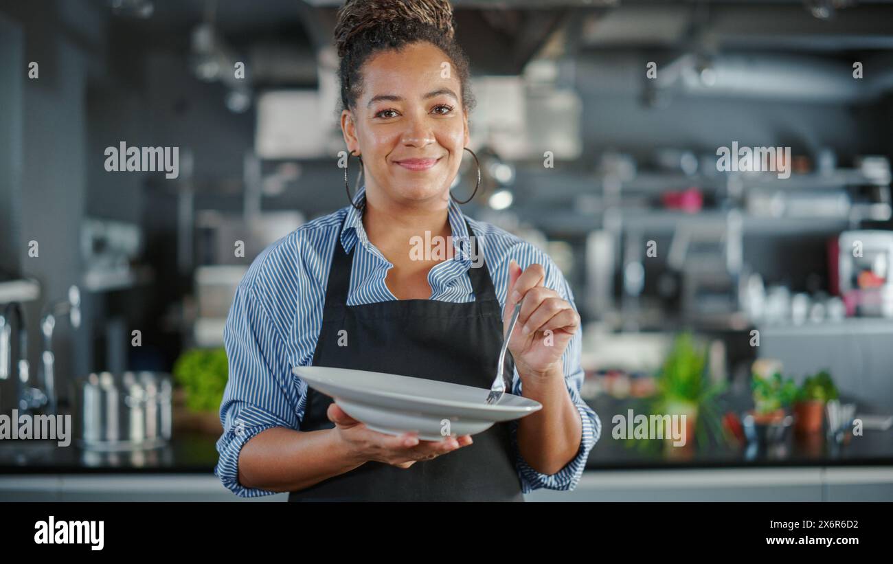Restaurant Kitchen: Portrait of Black Female Chef Preparing Dish ...