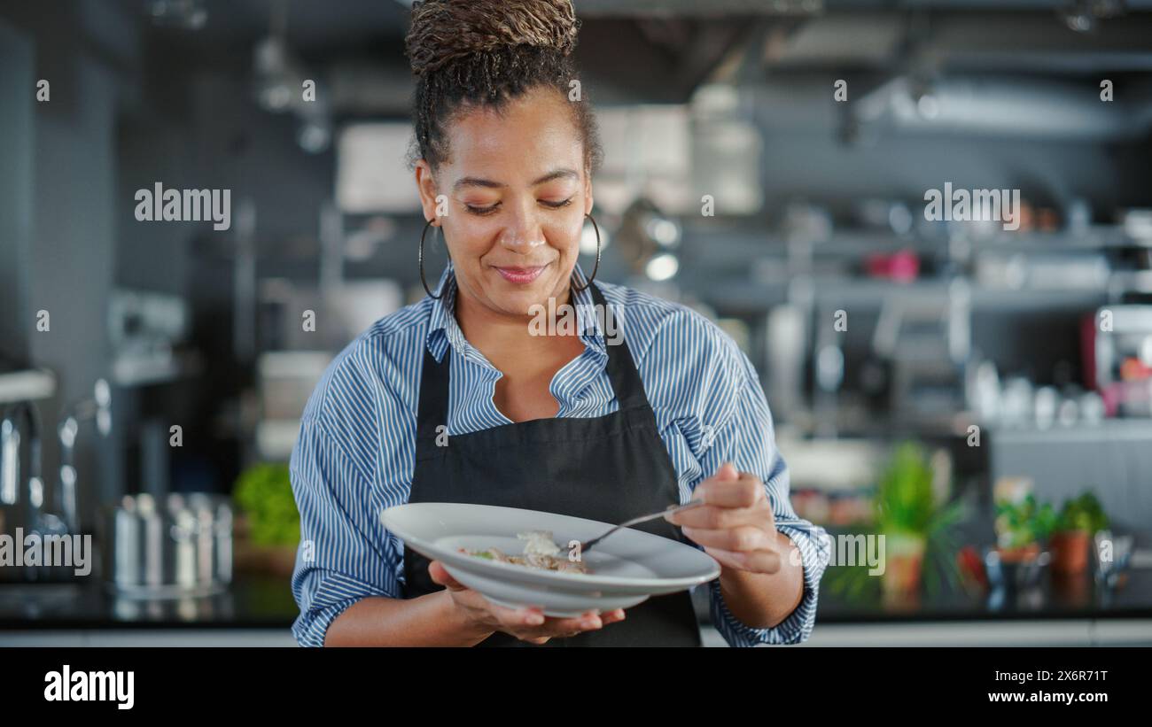 Restaurant Kitchen: Portrait of Black Female Chef Prepares Dish ...
