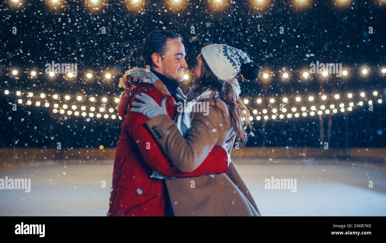 Romantic Winter Snowy Evening: Ice Skating Couple Having Fun on Ice ...