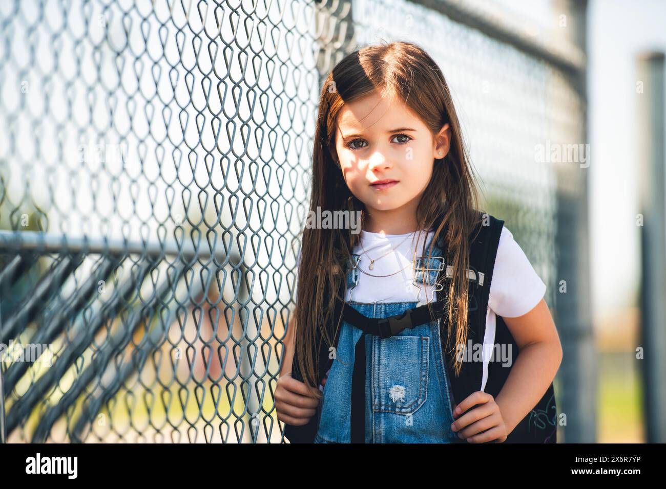 student girl wearing school backpack outside of the school Stock Photo ...