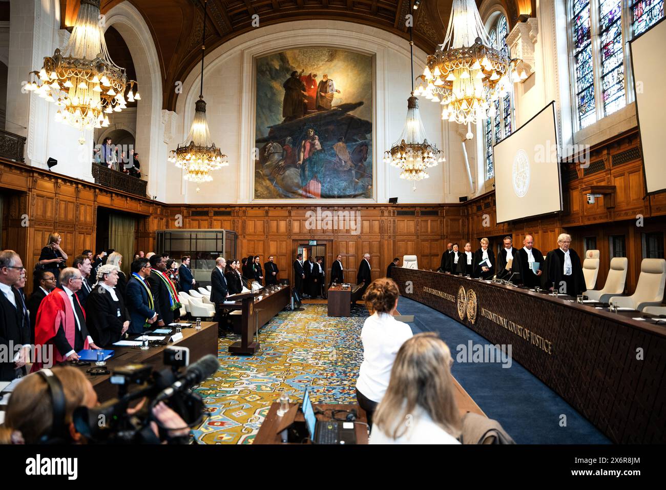 THE HAGUE - The judges enter the courtroom during a hearing at the ...