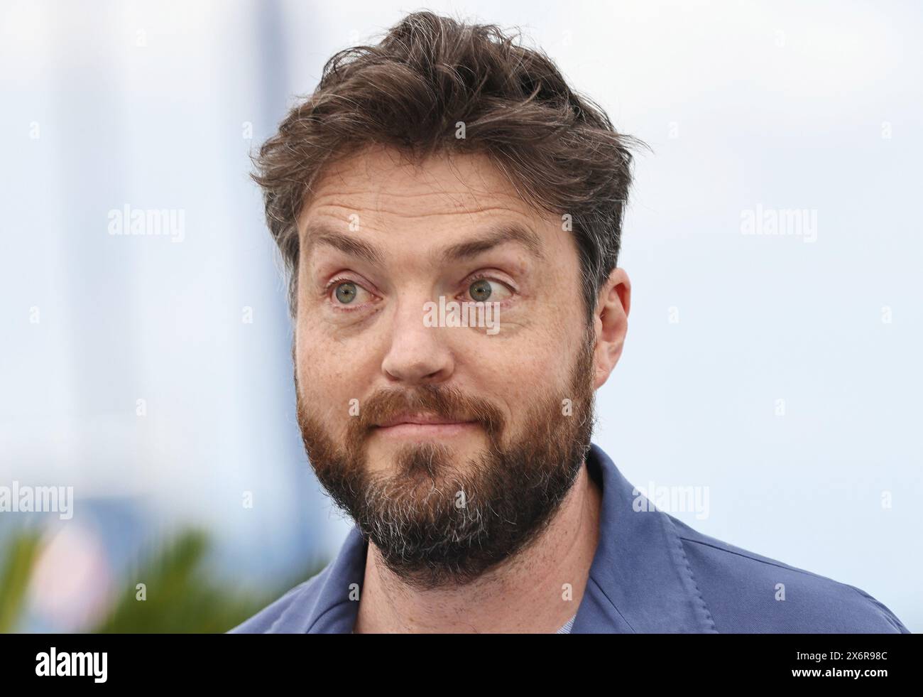 Cannes, France. 16th May, 2024. Actor Tom Burke poses during the ...