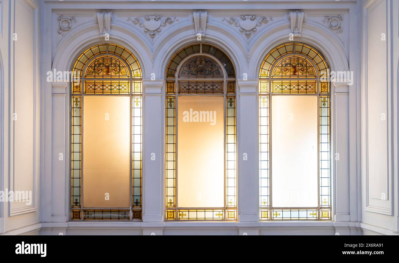 Close-up on three art deco windows inside palace in Italy Stock Photo ...
