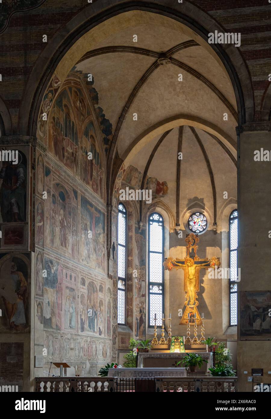 Big wooden crucifix decorating altar of little chapel inside medieval ...