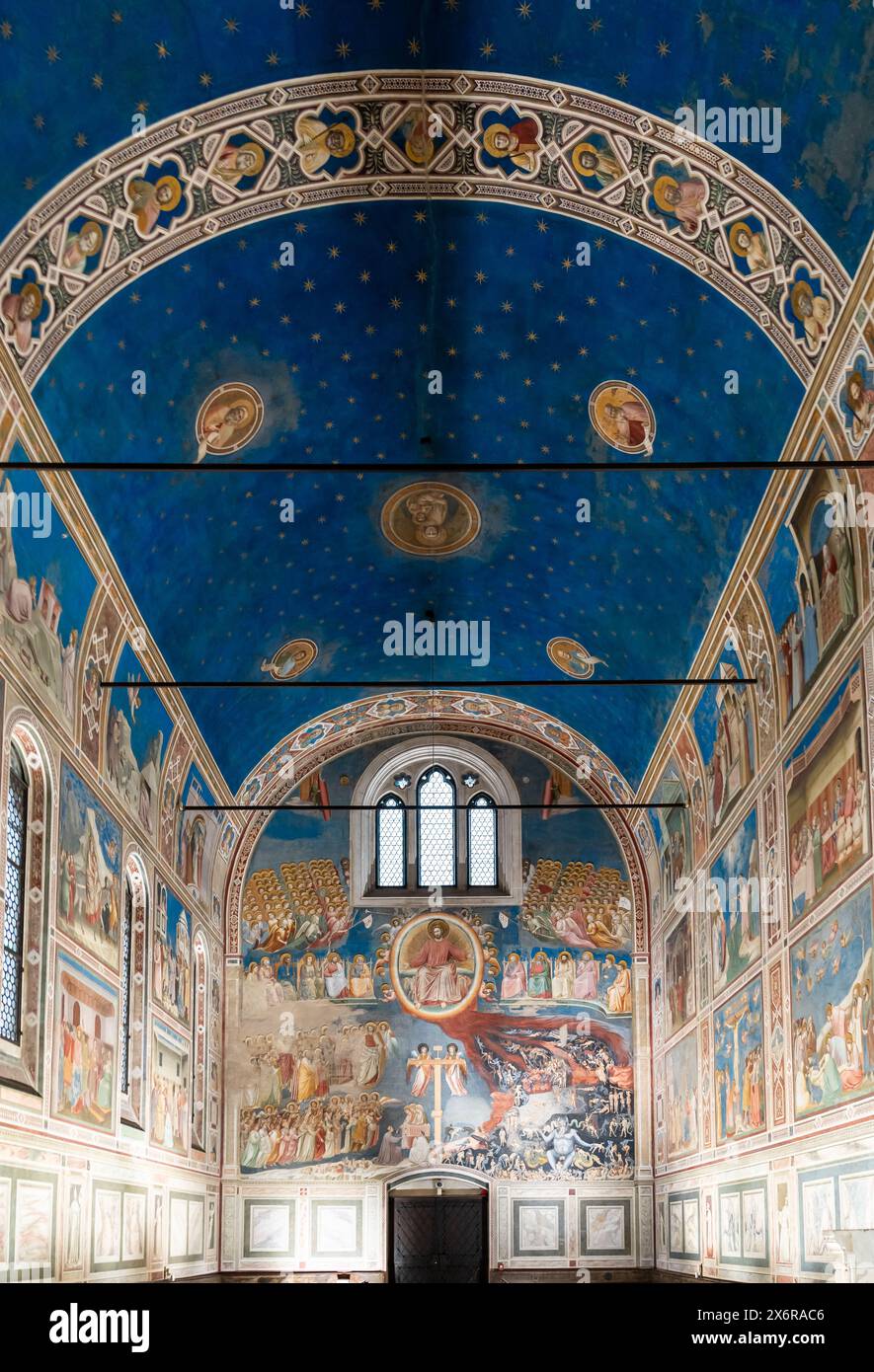 Blue ceiling decoration and frescoes inside catholic church in Italy ...