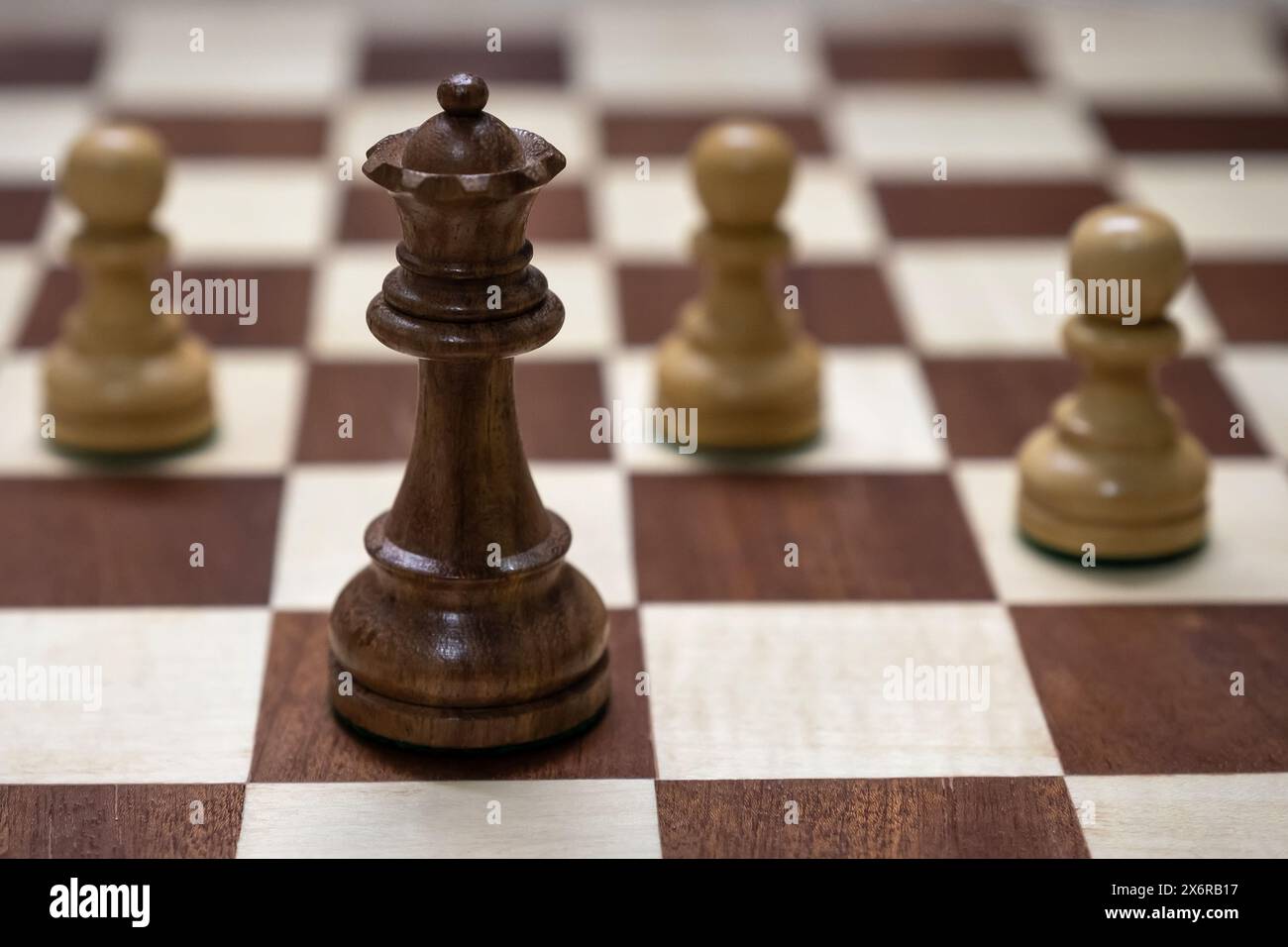 Wooden chess board with chess pieces. Checkmate Stock Photo - Alamy