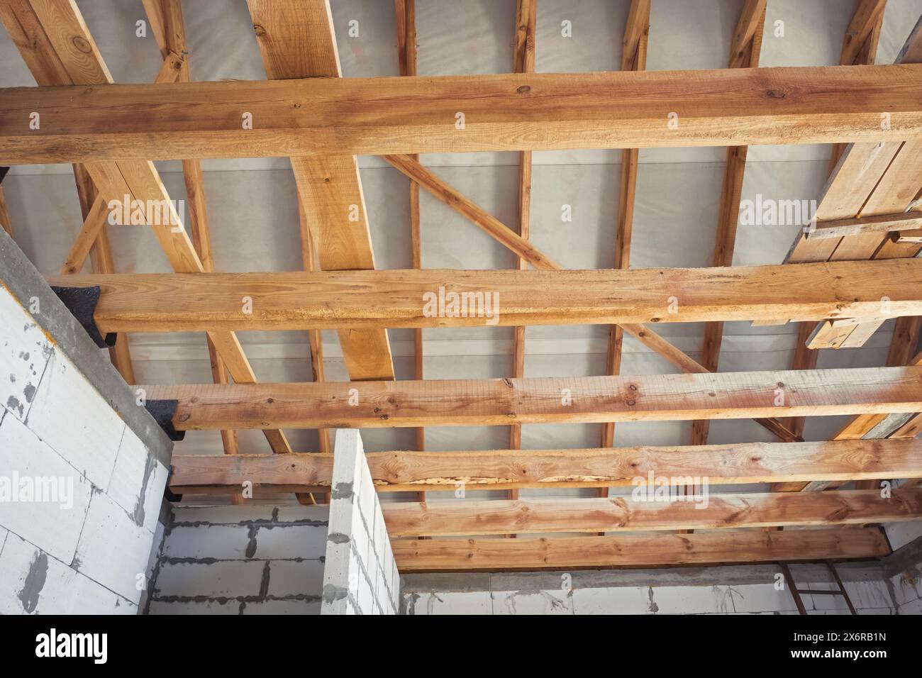 Timber frame of the roof of the new house. Roofing structures. Wooden ...