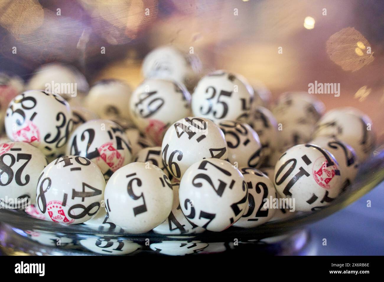 8 May 2024: Lottery balls in a glass ball. Balls with numbers. Symbolic ...