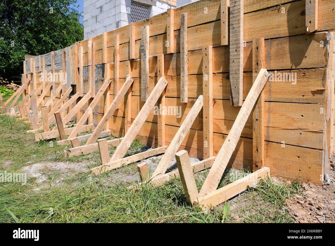 Fastening wooden formwork to the foundation for pouring the foundation ...