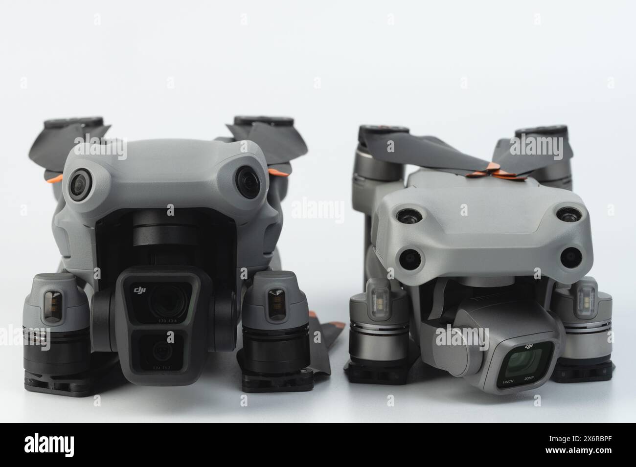New York, USA - May 11, 2024: Compare two DJI air drones stand side by ...
