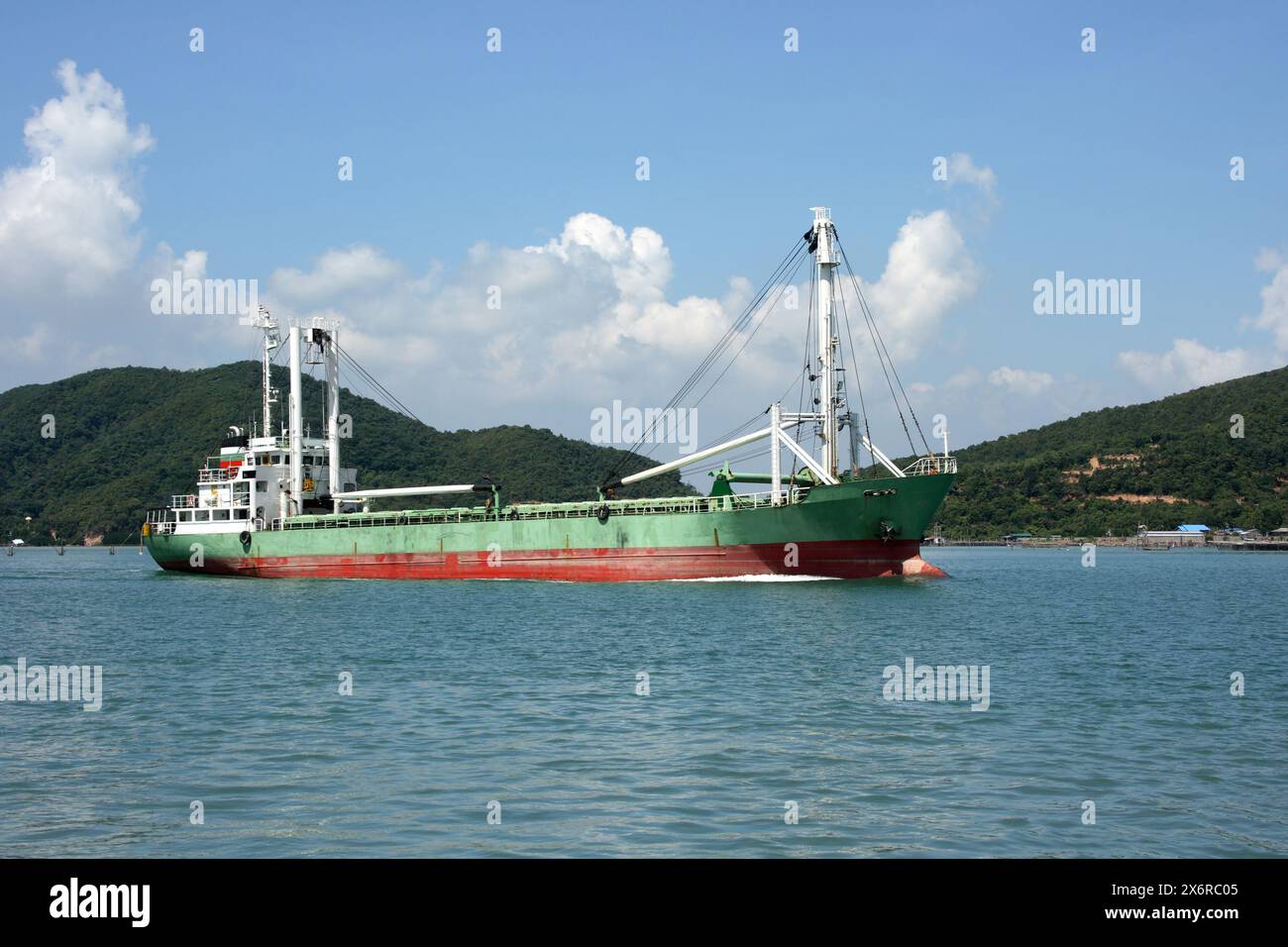Empty cargo ship leaving Songkhla in Southern Thailand Stock Photo - Alamy