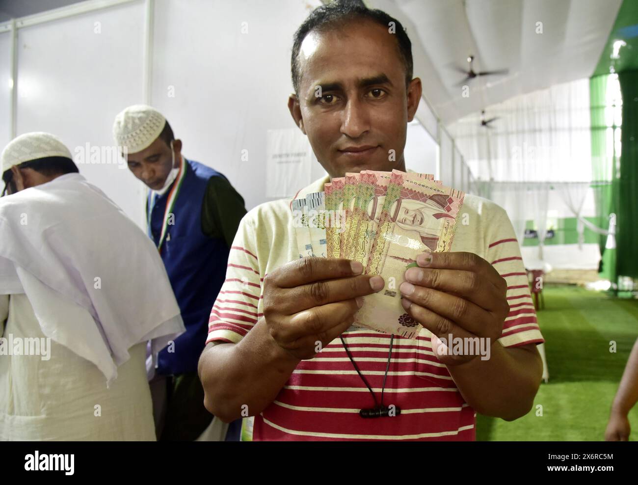 May 16, 2024, Guwahati, Guwahati, India: Haj pilgrims exchange Indian ...