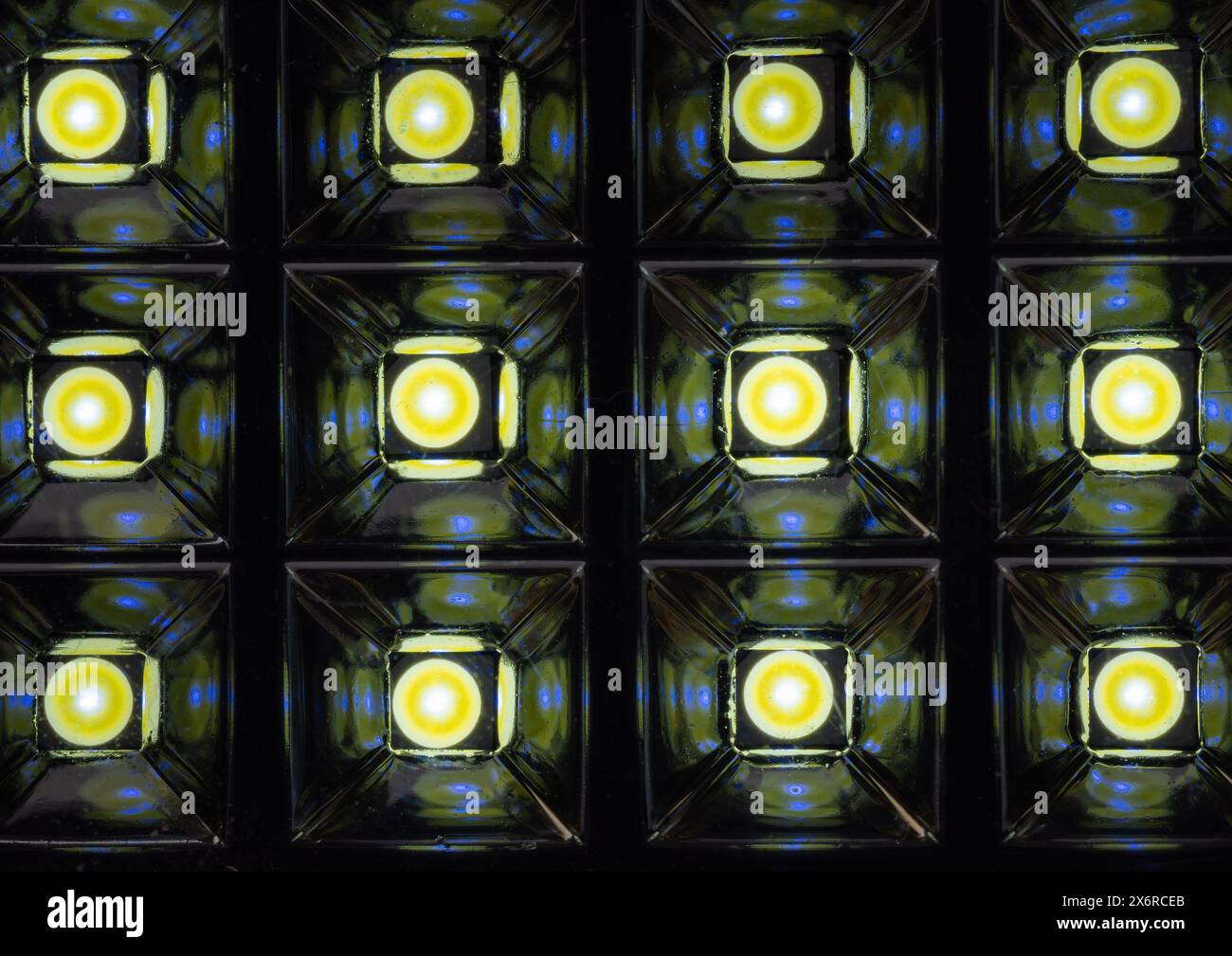 A modern and abstract photo showcasing a grid of glass cubes housing ...