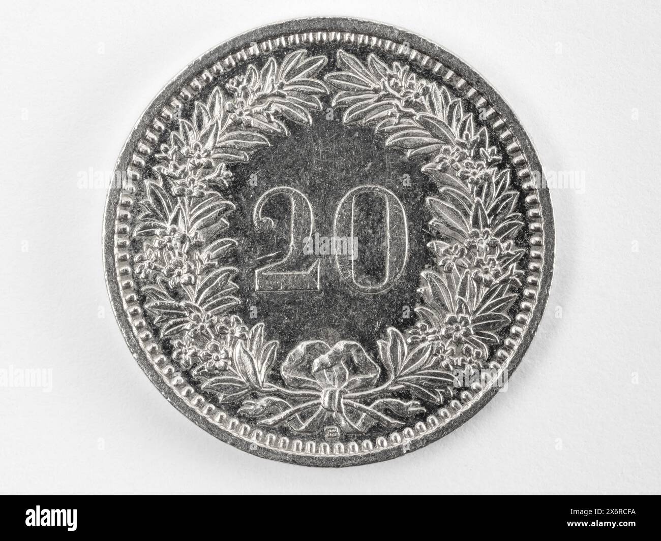 Close-up of a swiss 20 cents coin, white background, front side Stock ...
