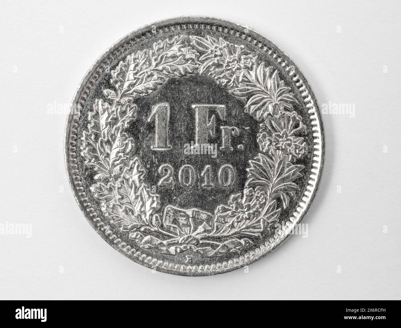 Close-up of a swiss one franc coin, white background, front side Stock ...