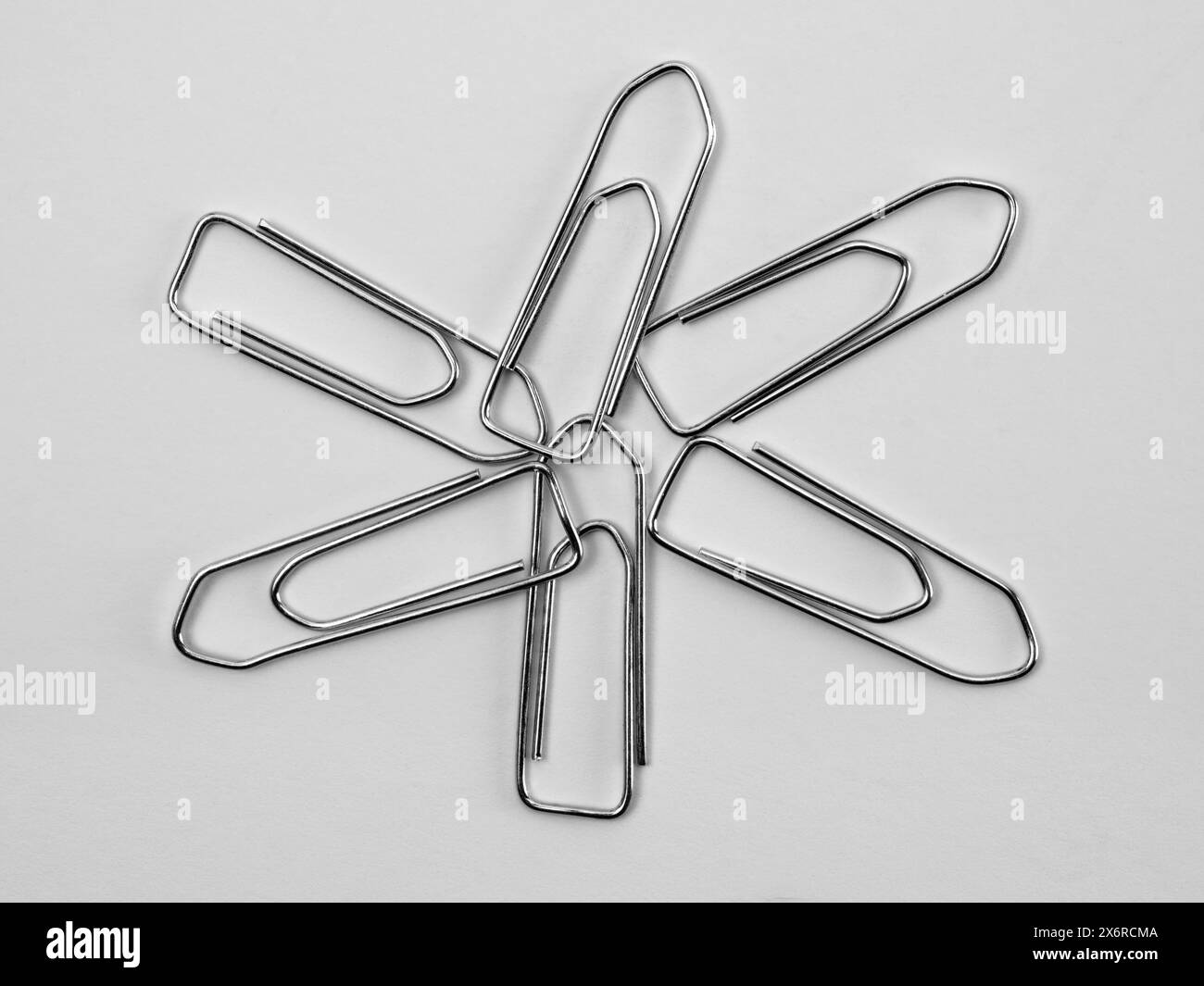 Image of silver paper clips isolated on white background Stock Photo ...