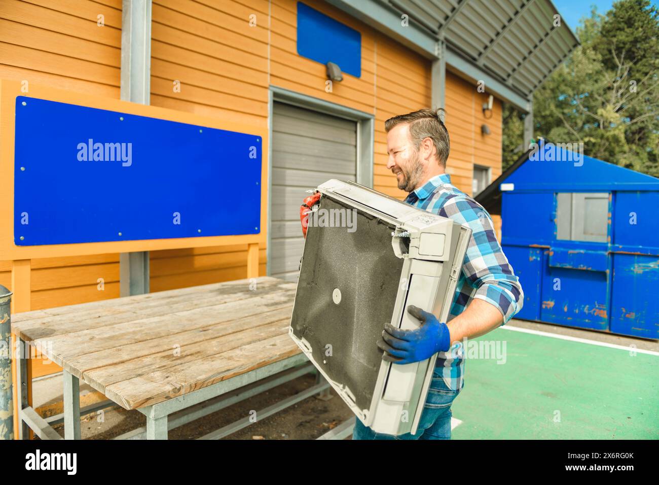 a worker who recycling thing on recycle center Stock Photo - Alamy