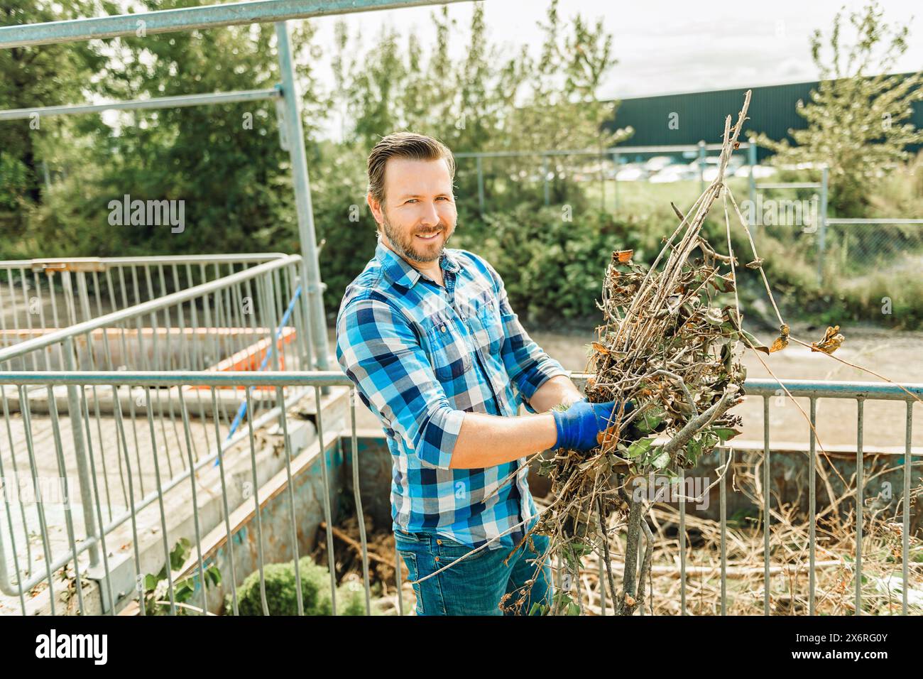 a worker who recycling thing on recycle center Stock Photo - Alamy