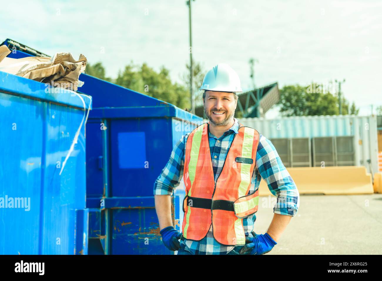 worker who recycling cardboard on recycle center Stock Photo - Alamy