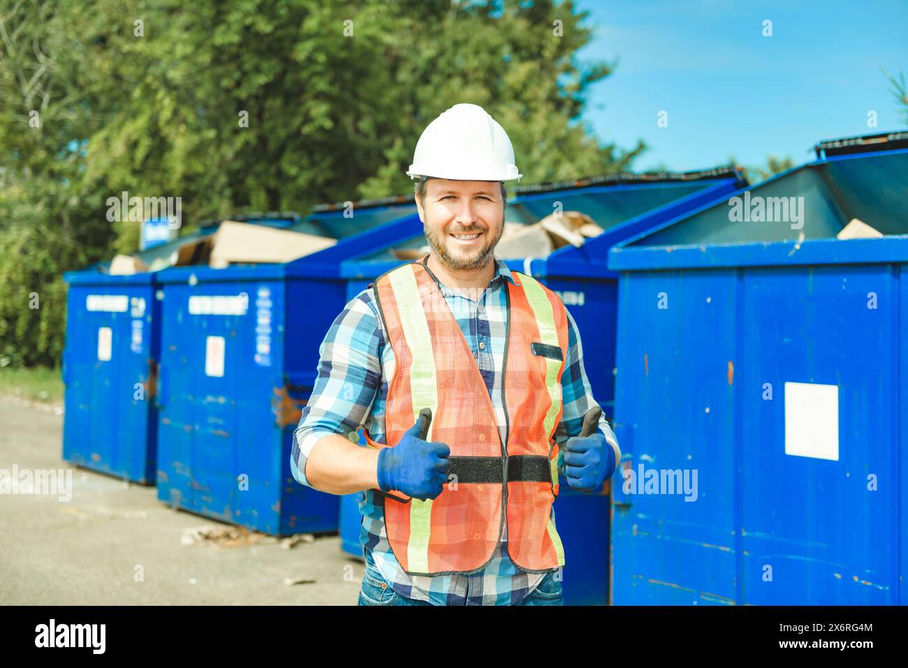 worker who recycling cardboard on recycle center Stock Photo - Alamy