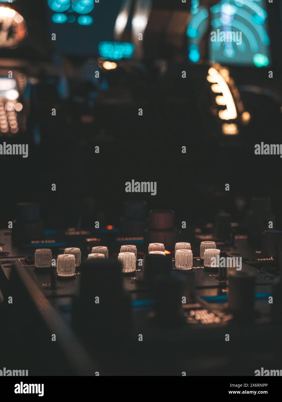 Cockpit view of an airplane during a night-time flight with illuminated ...