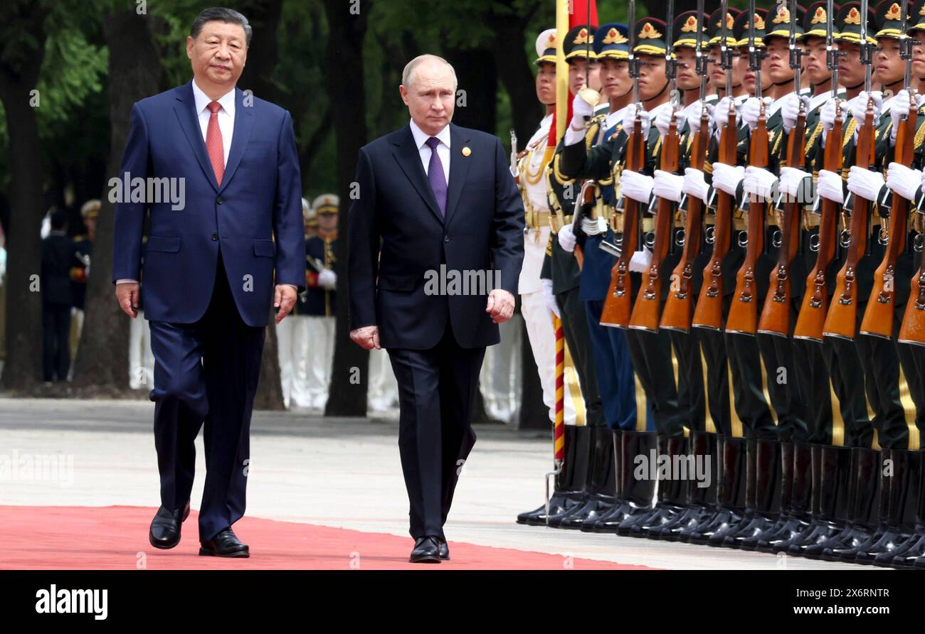 Beijing, China. 16th May, 2024. Russian President Vladimir Putin, right ...