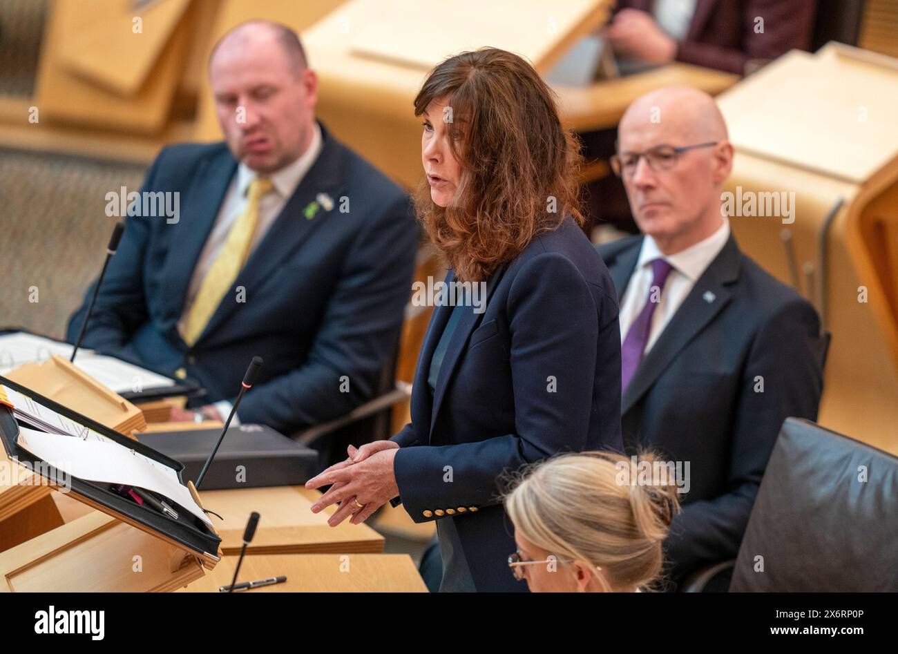 Lord Advocate Dorothy Bain KC in the main chamber delivers a statement ...