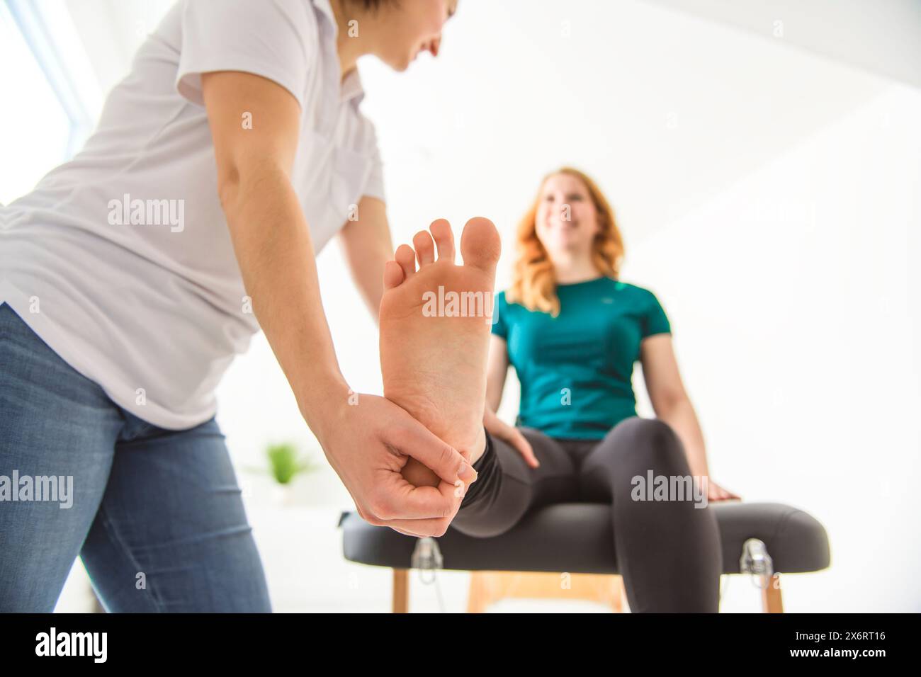 Modern rehabilitation physiotherapy at work with client Stock Photo - Alamy