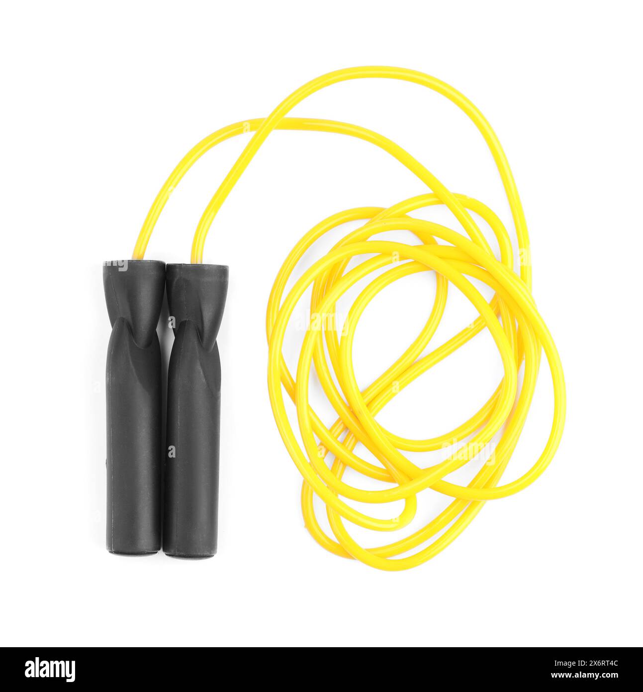 Yellow skipping rope isolated on white, top view. Sports equipment ...