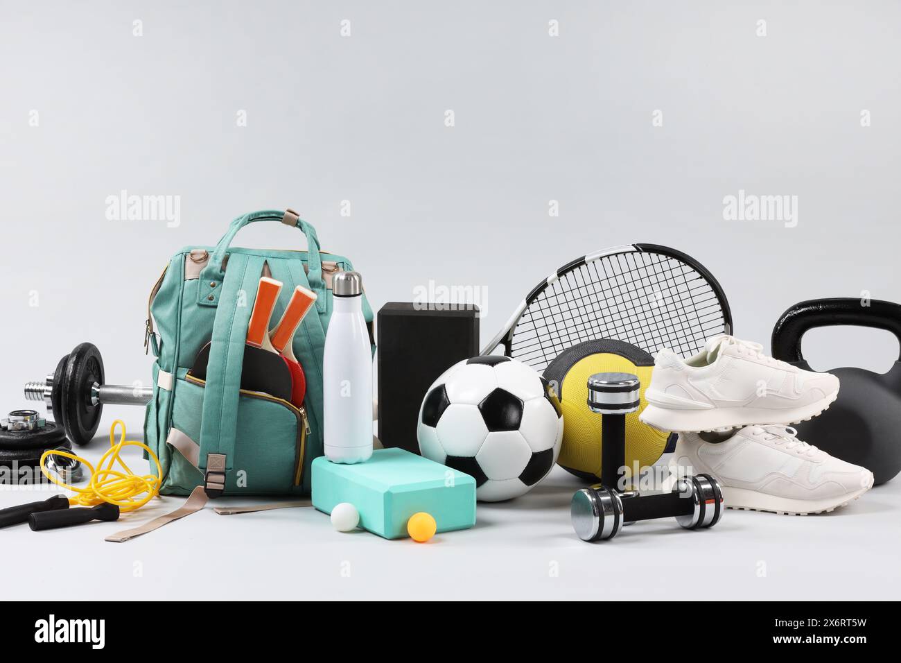 Many different sports equipment on light grey background Stock Photo ...